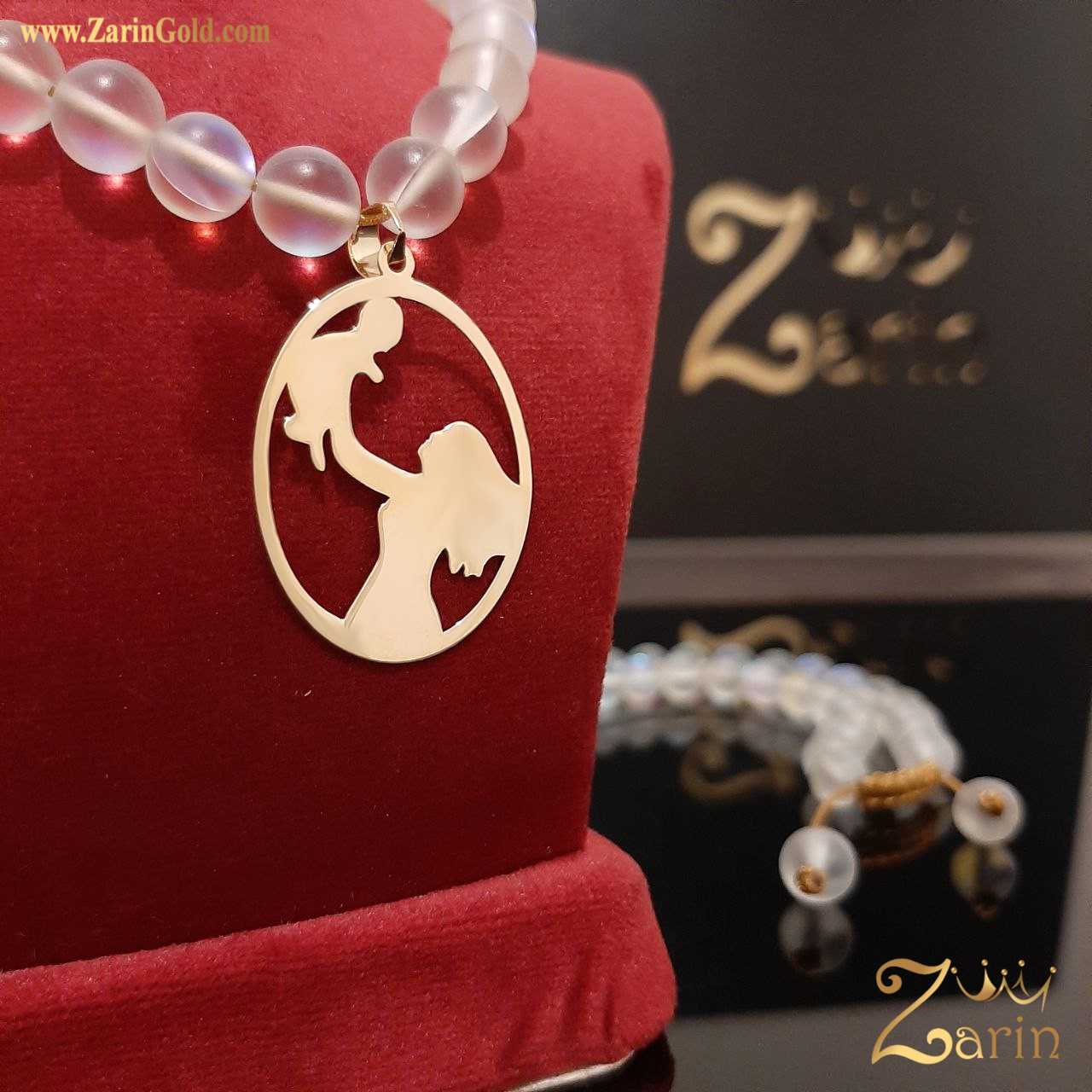 پلاک طلا طرح مادر و کودک طلای زرین گالری خرید طلا